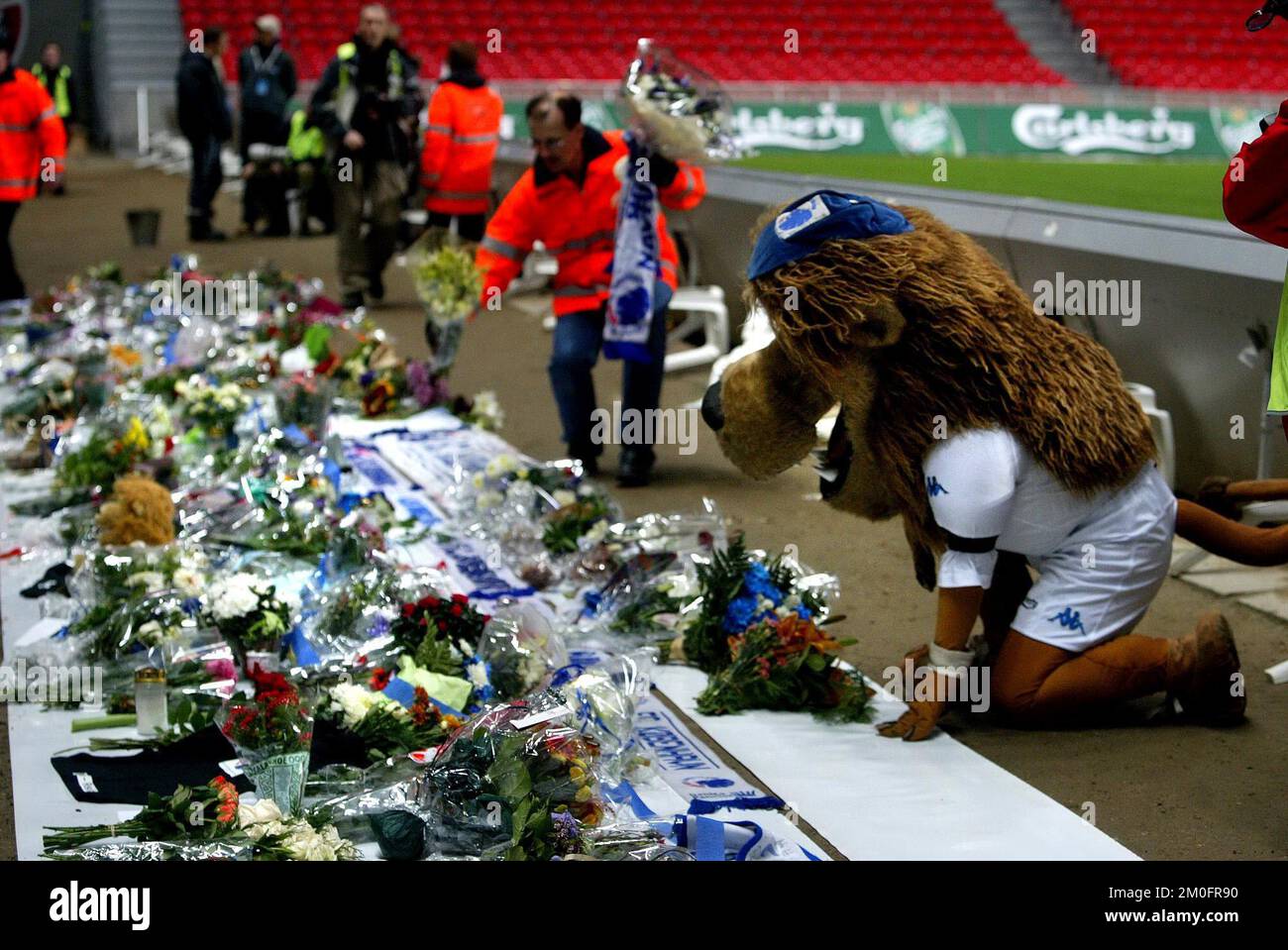 Flowers are placed by the pitch ahead of the first Copenhagen FC since ...