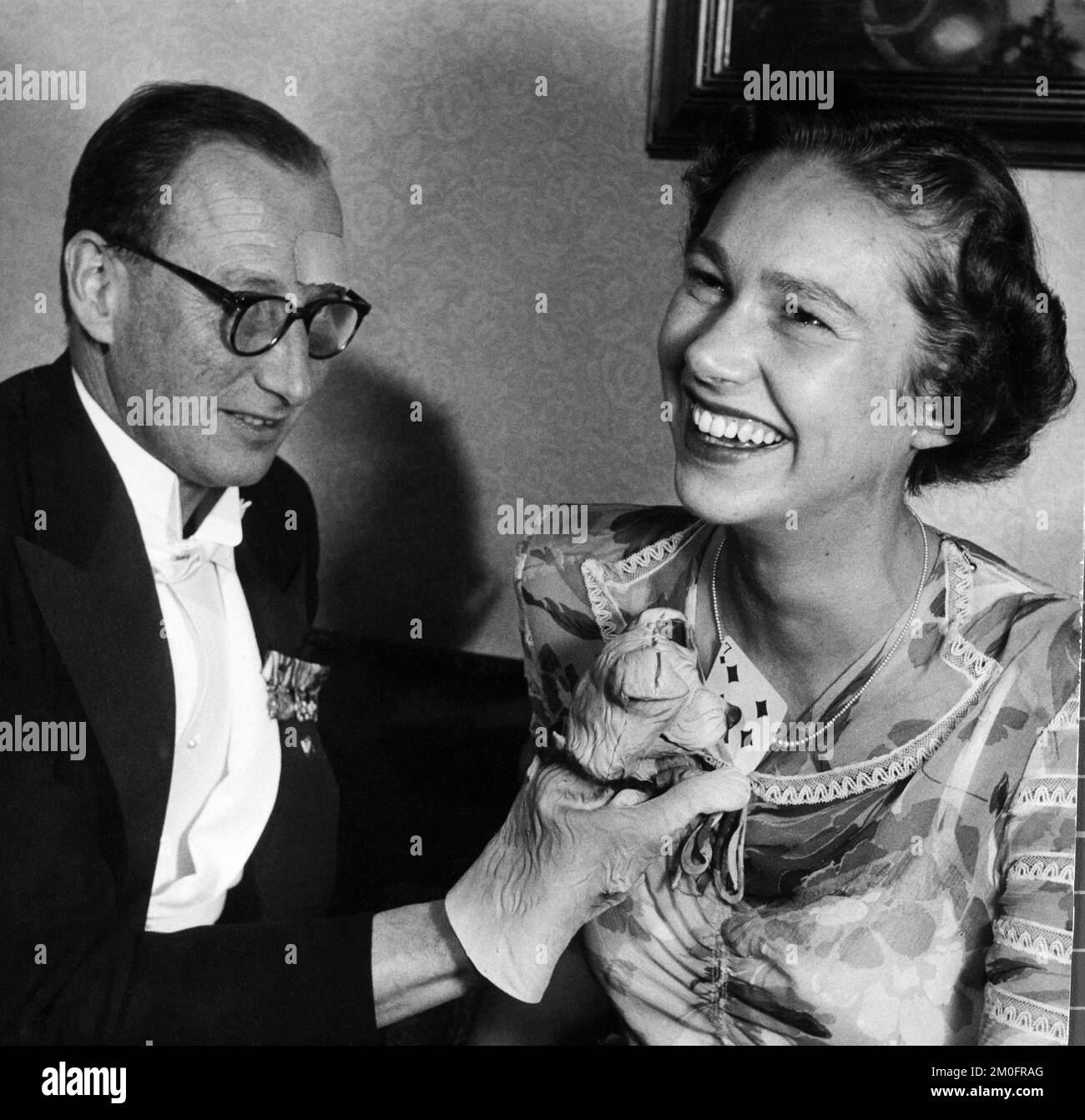 Prince Knud of Denmark performing magic tricks with a puppet Stock ...