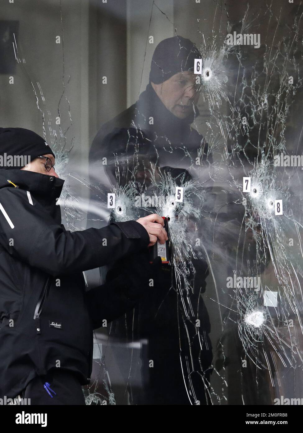 Police technicians working at Krudttonnen after the Copenhagen shooting ...
