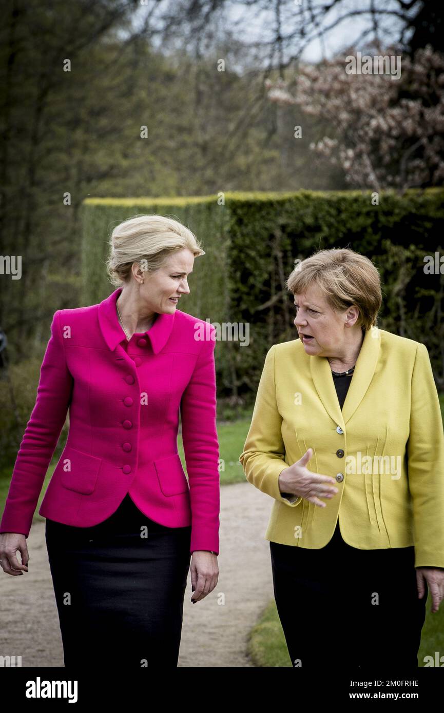 German Chancellor Angela Merkel (R) and Danish Prime Minister Helle ...