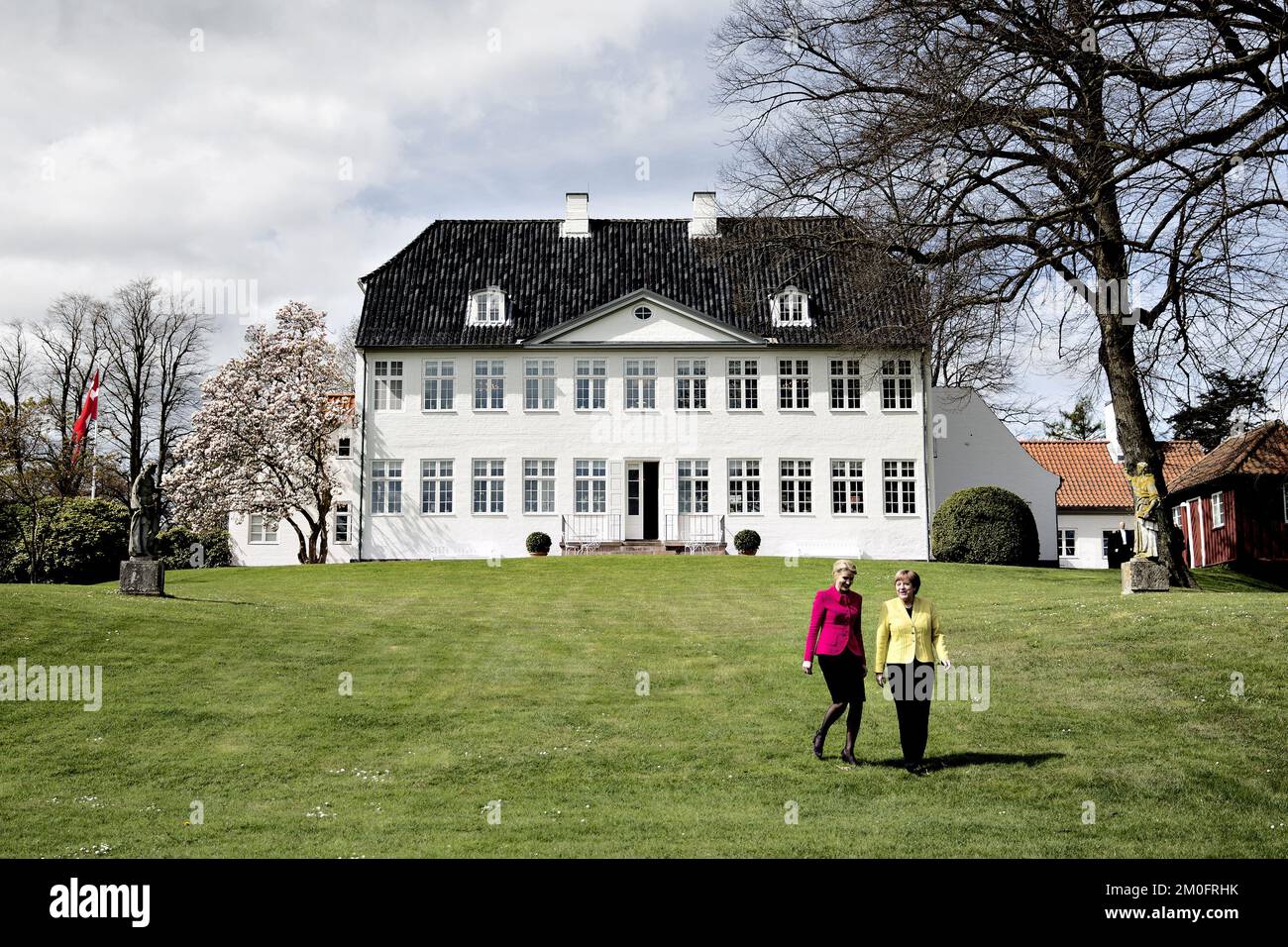 German Chancellor Angela Merkel (R) and Danish Prime Minister Helle ...