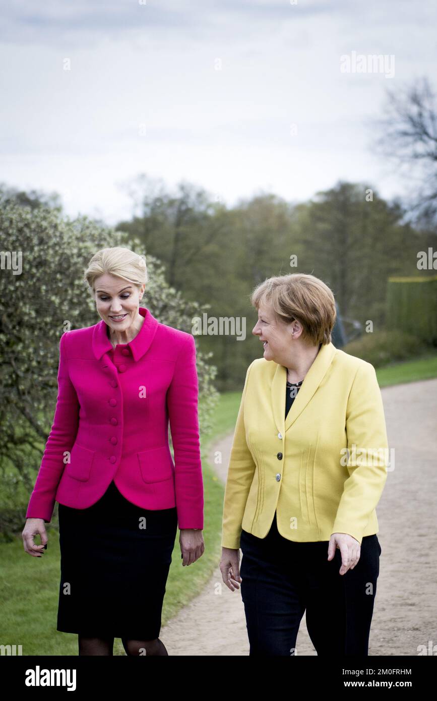 German Chancellor Angela Merkel (R) and Danish Prime Minister Helle ...