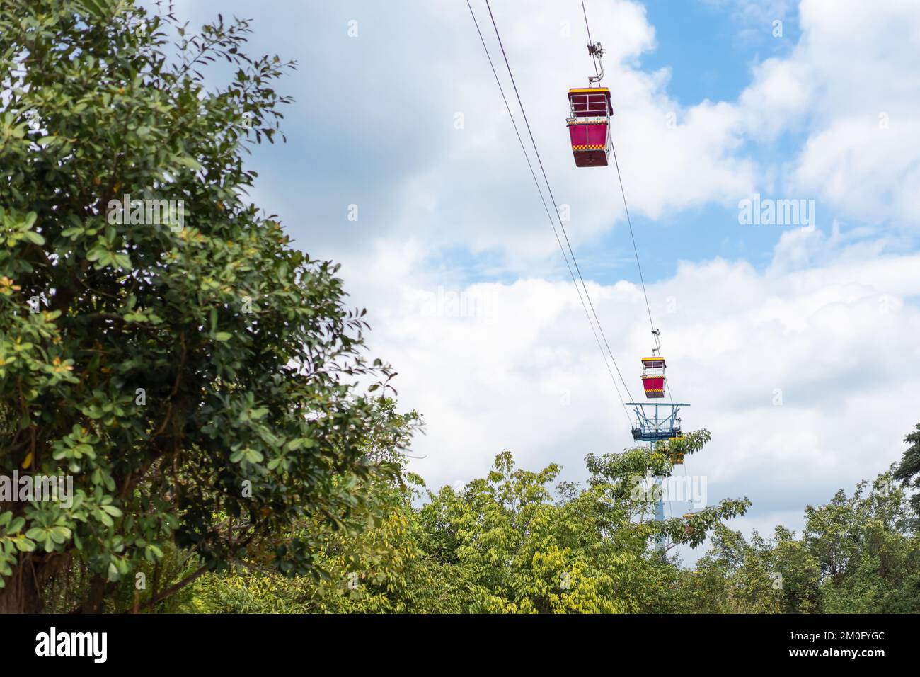 red cable car are floating on a sling for transportation by visitors ...