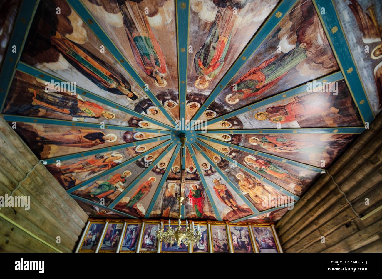 Inside the wooden temple. Iconostasis and icons of the Pochozero churchyard. Russia, Arkhangelsk ...