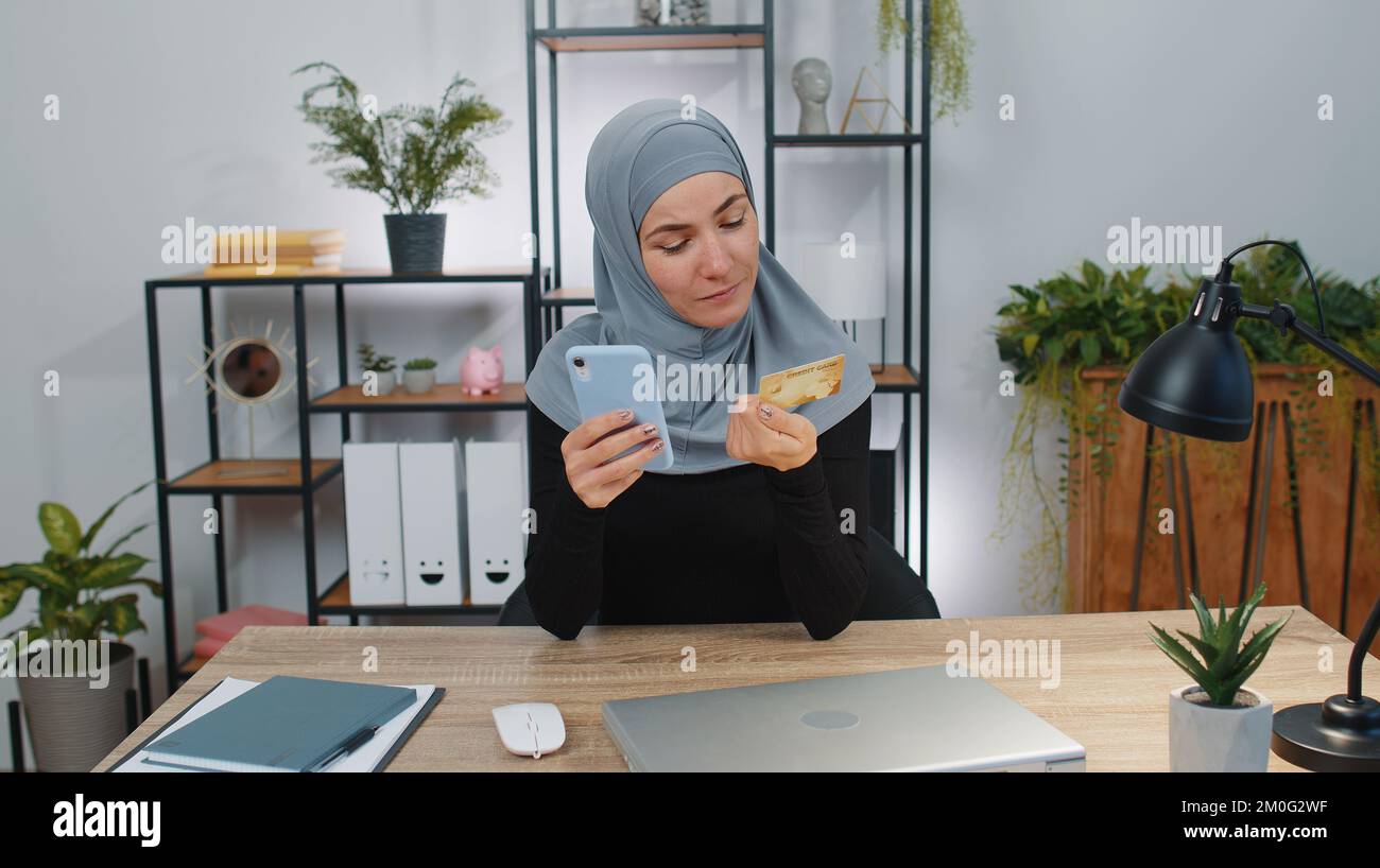 Businesswoman programmer software developer in hijab working, making ...