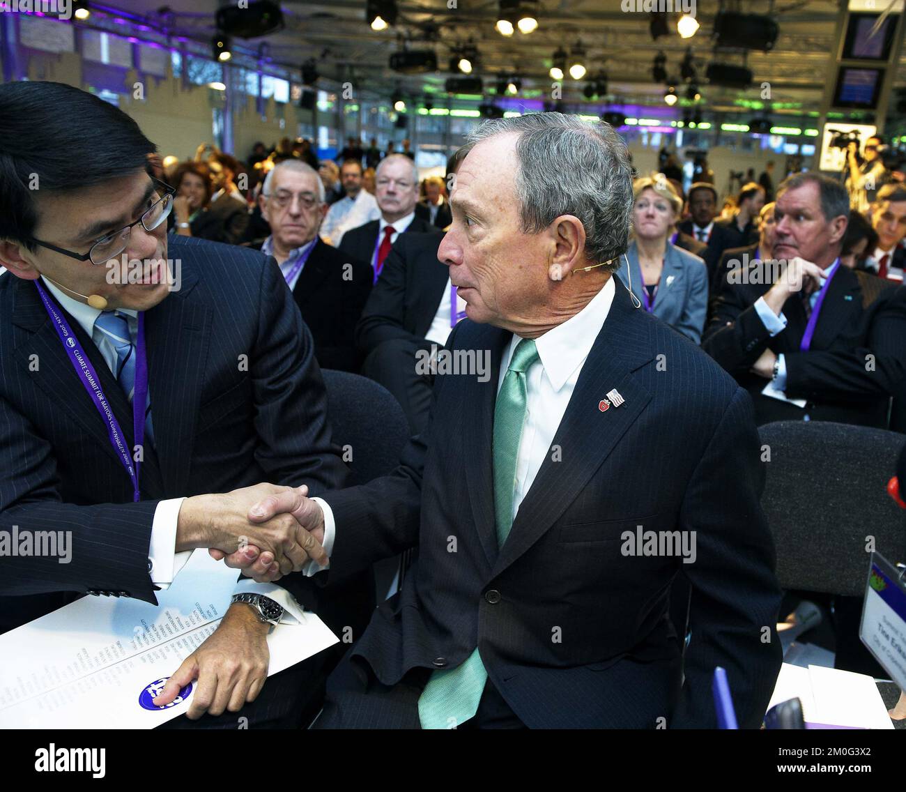 Hong Kong mayor Tang-wah Yau greeting New York mayor Michael Bloomberg ...