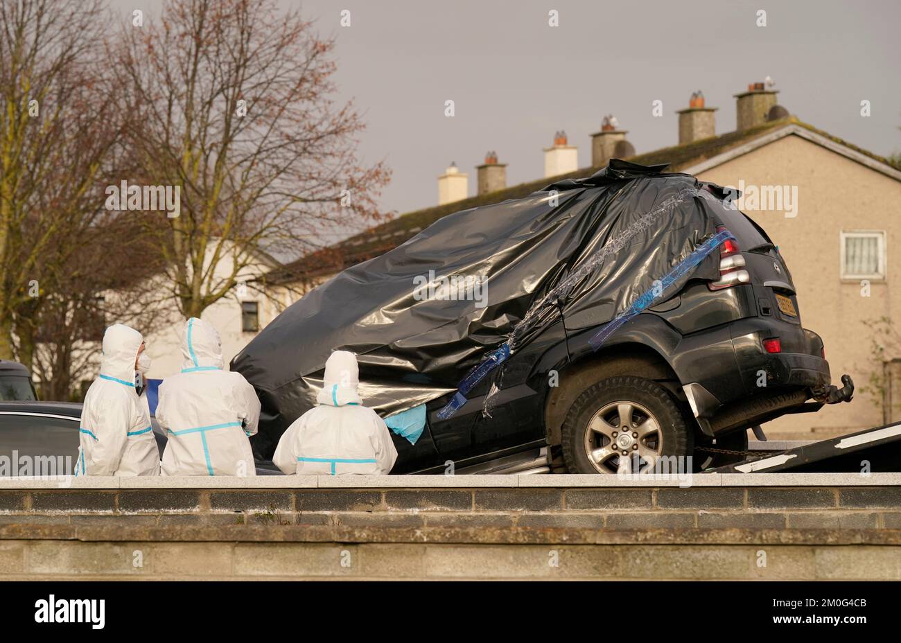 A black Toyota Land Cruiser is taken away from the scene in Ronanstown ...
