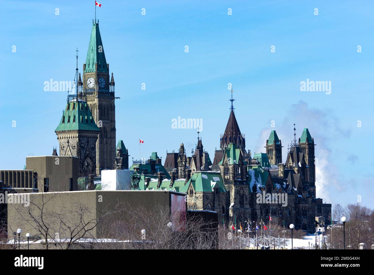 A winter view of Canada's Parliament Buildings with snow draping the ...