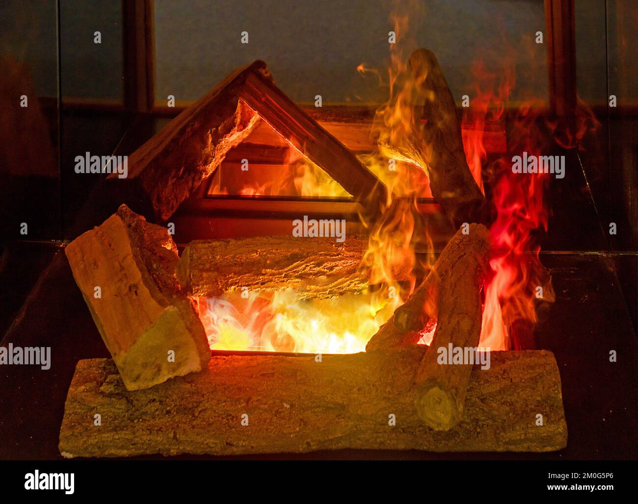 Detail of hot burning wood fire inside fireplace Stock Photo - Alamy