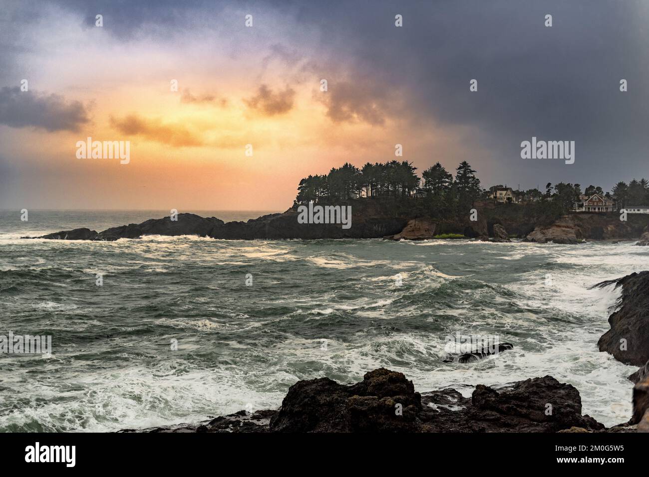 An aerial view of the wavy sea at sunset Stock Photo - Alamy