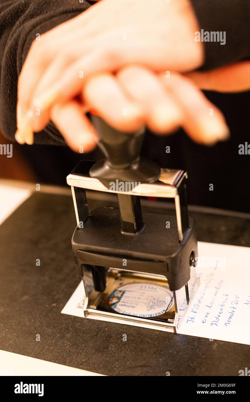 Freiburg, Germany. 06th Dec, 2022. Sevilay Catakli, an employee of a ...