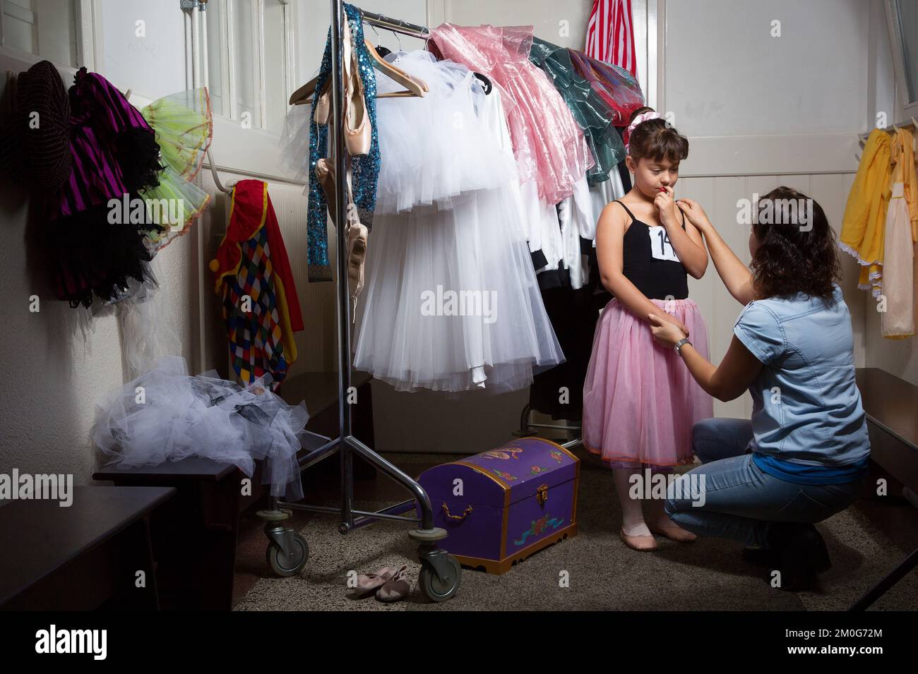 Little girl is sad and comforted after losing dance competition ...