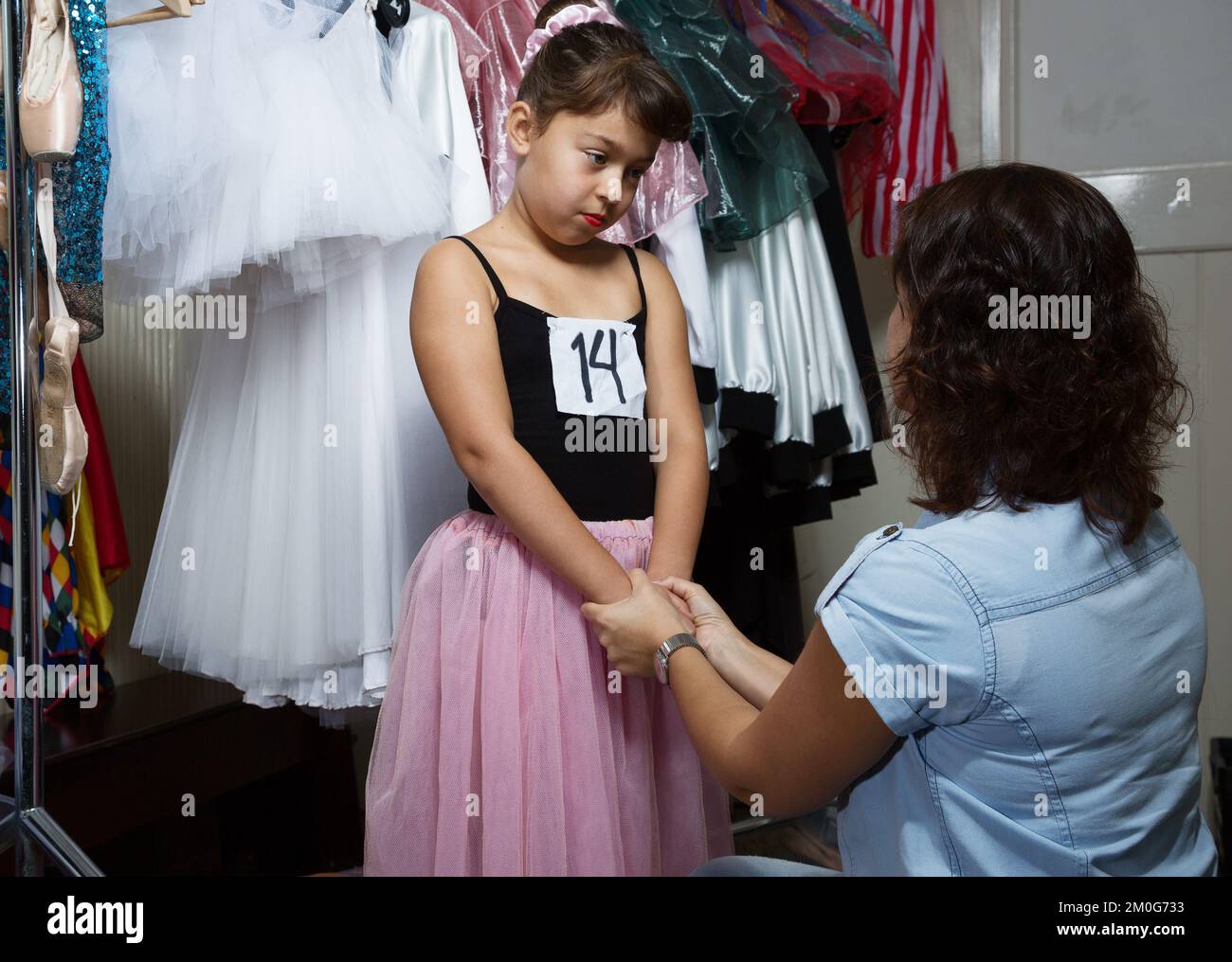 Little girl is sad and comforted after losing dance competition ...