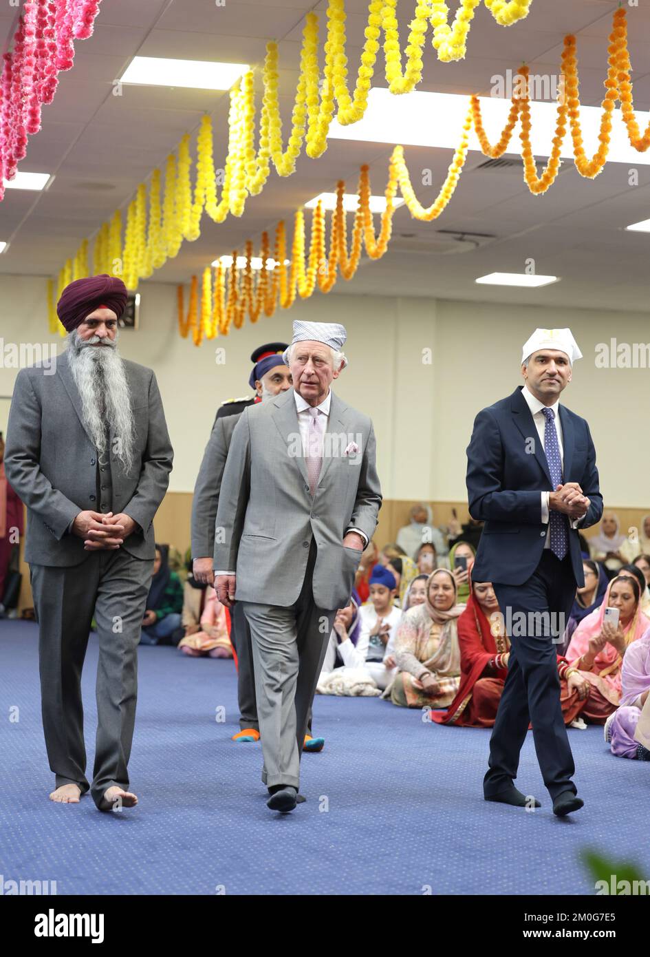 King Charles III nters the Prayer Hall with Professor Gurch Randhawa ...