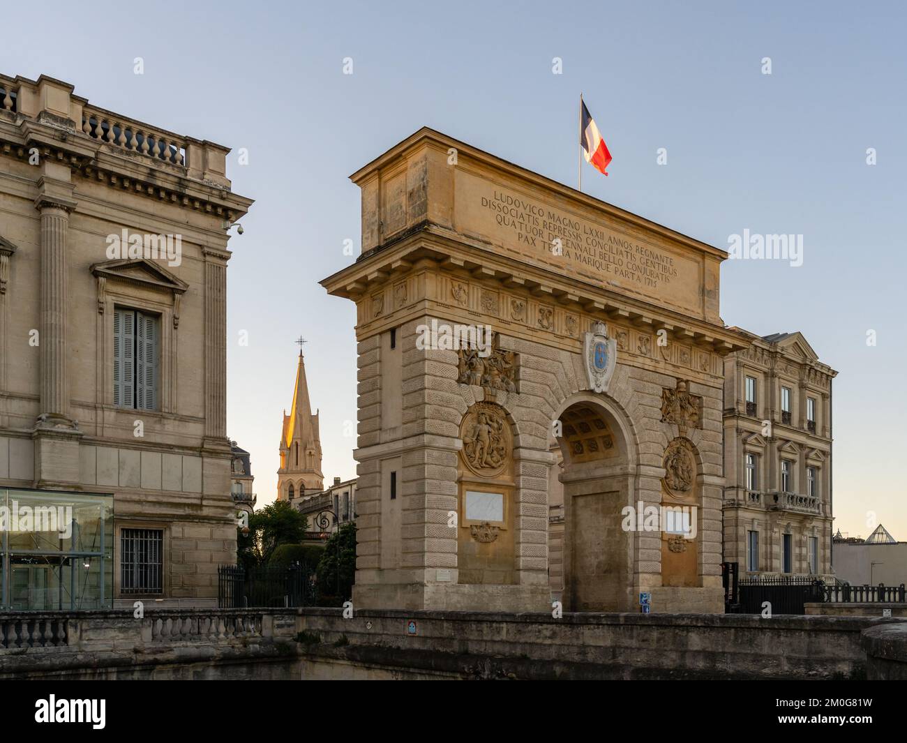 Early morning view of historic Porte du Peyrou arch of triumph with ...