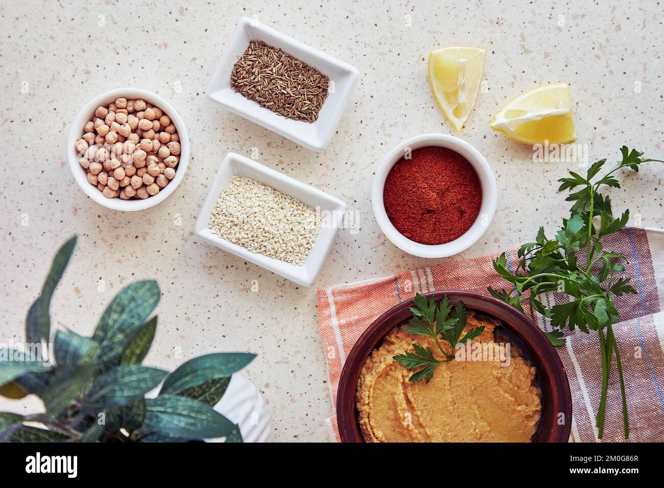 Hummus spread, made from cooked and smashed chickpeas, tahini, olive ...