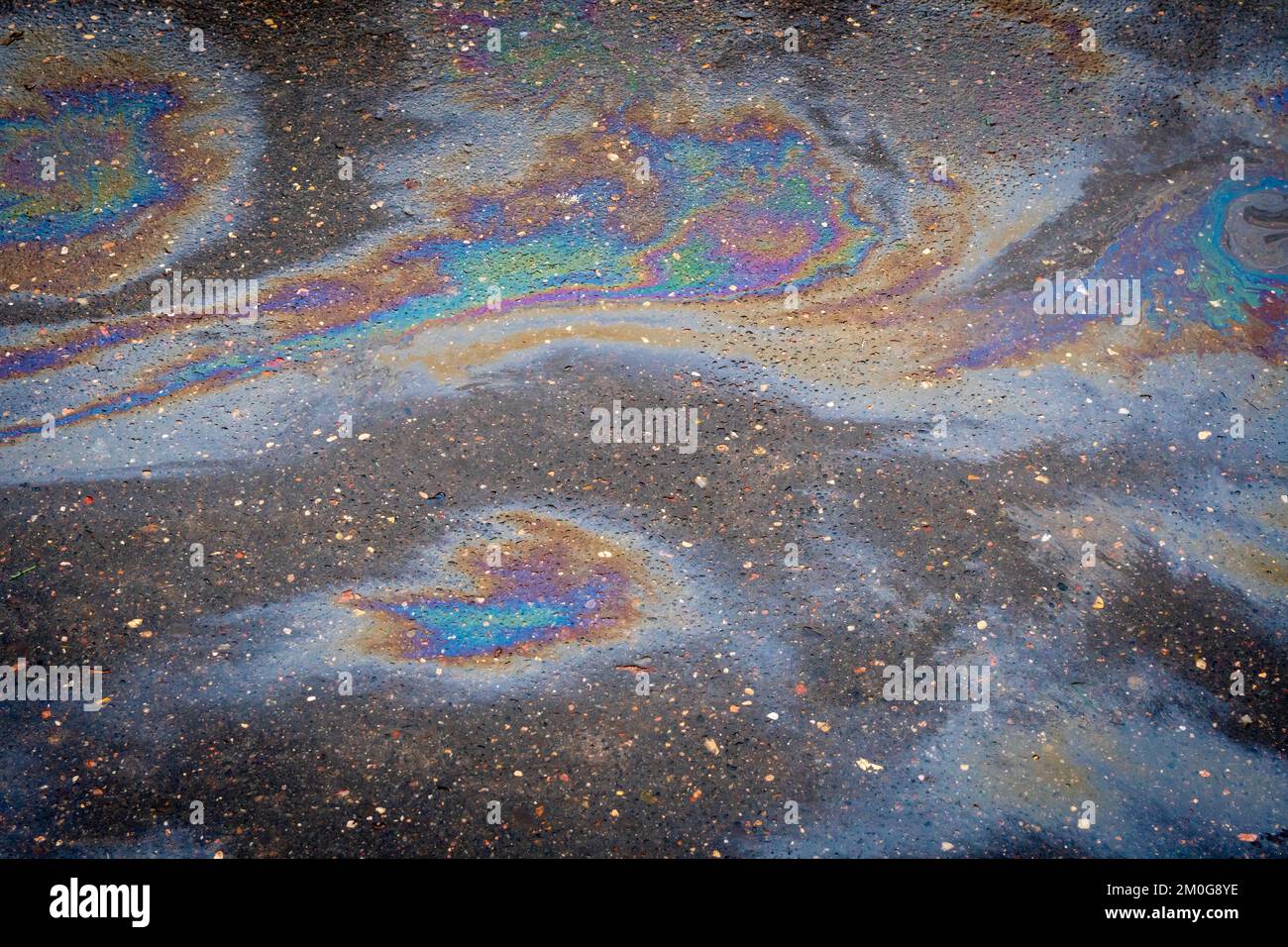 Rainbow colored oil stain on hi-res stock photography and images - Alamy