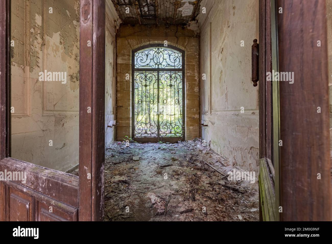 An old abandoned decayed building with a vintage door Stock Photo - Alamy