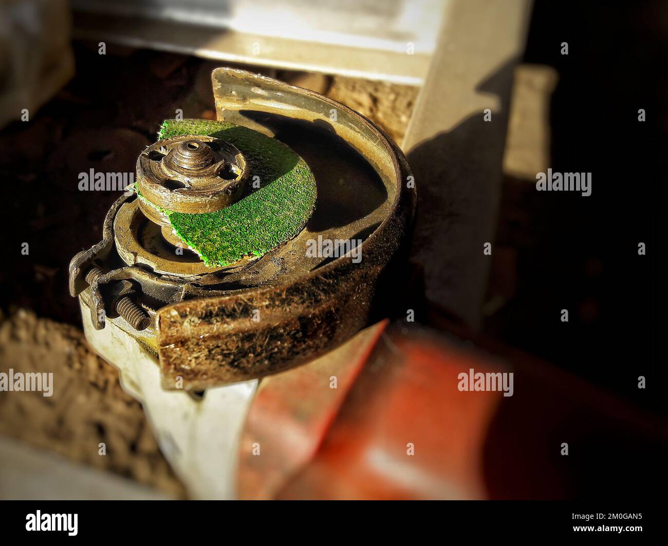 broken cutting wheel on angle grinder closeup shot Stock Photo - Alamy
