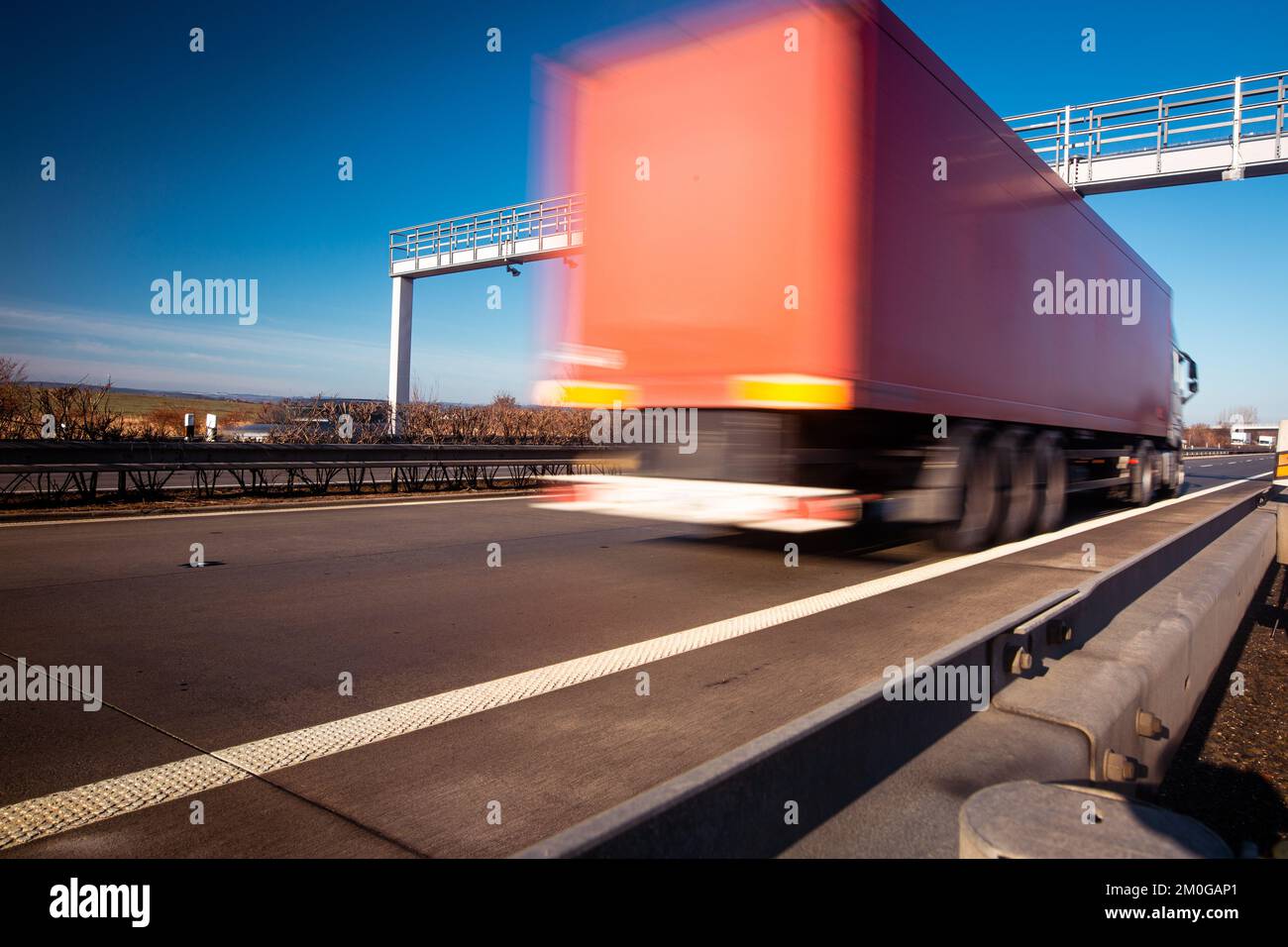 Trucks passing through the toll gate on highway, highway fee ...