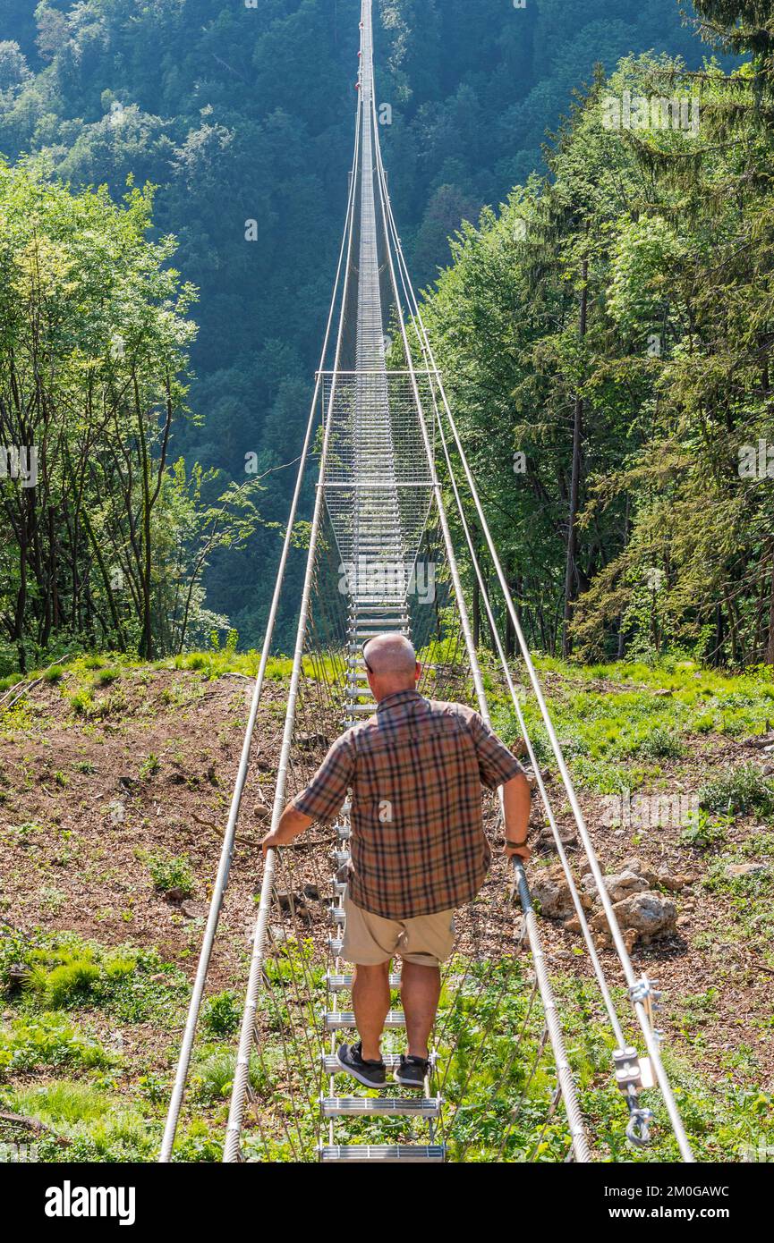 suspension bridge, dossena, italy Stock Photo - Alamy