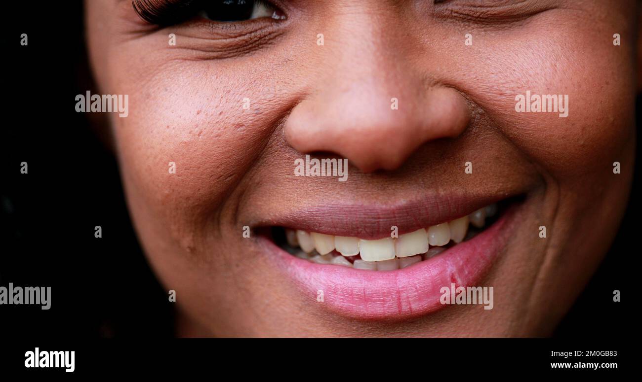 African mixed race young woman macro close-up face smiling Stock Photo ...