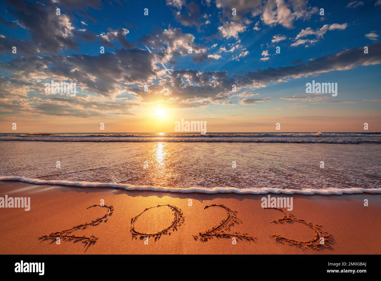 Happy New Year 2023 concept, lettering on the beach. Written text on ...
