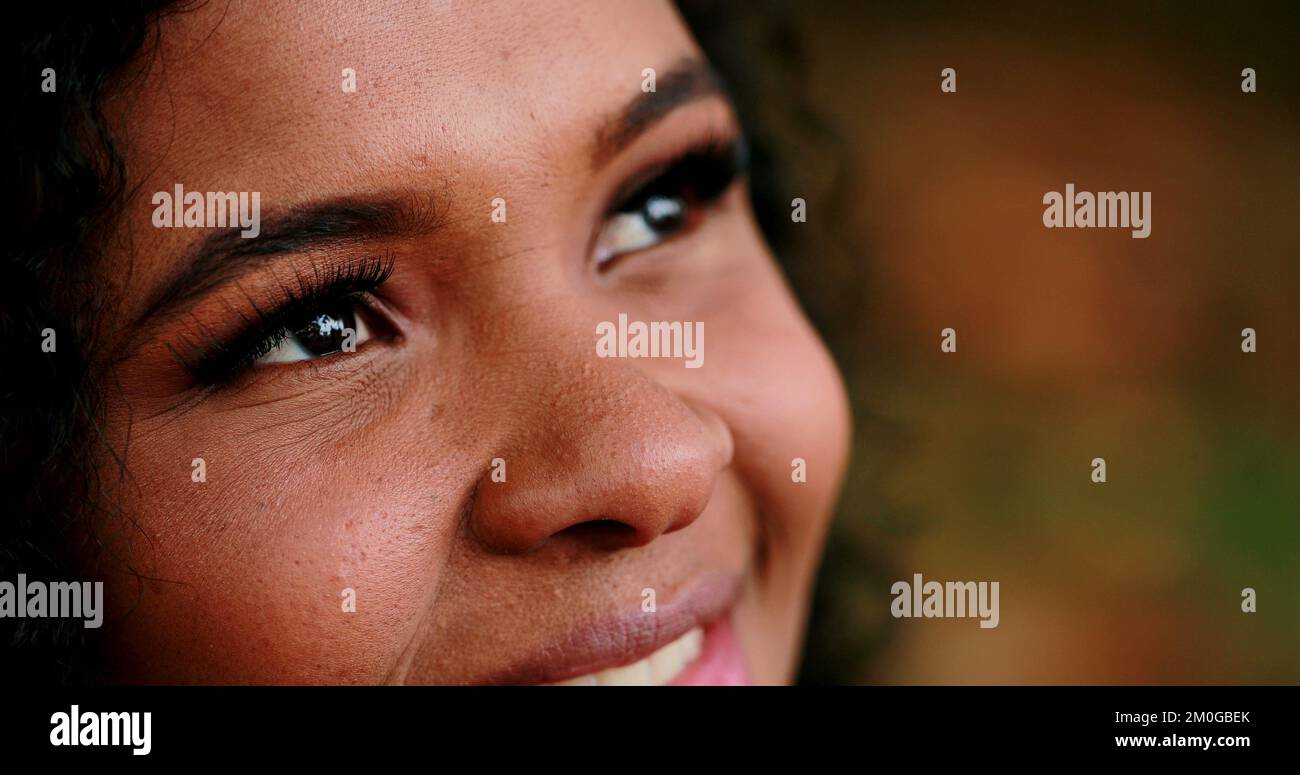 Beautiful Brazilian hispanic black woman closing and opening eyes in ...