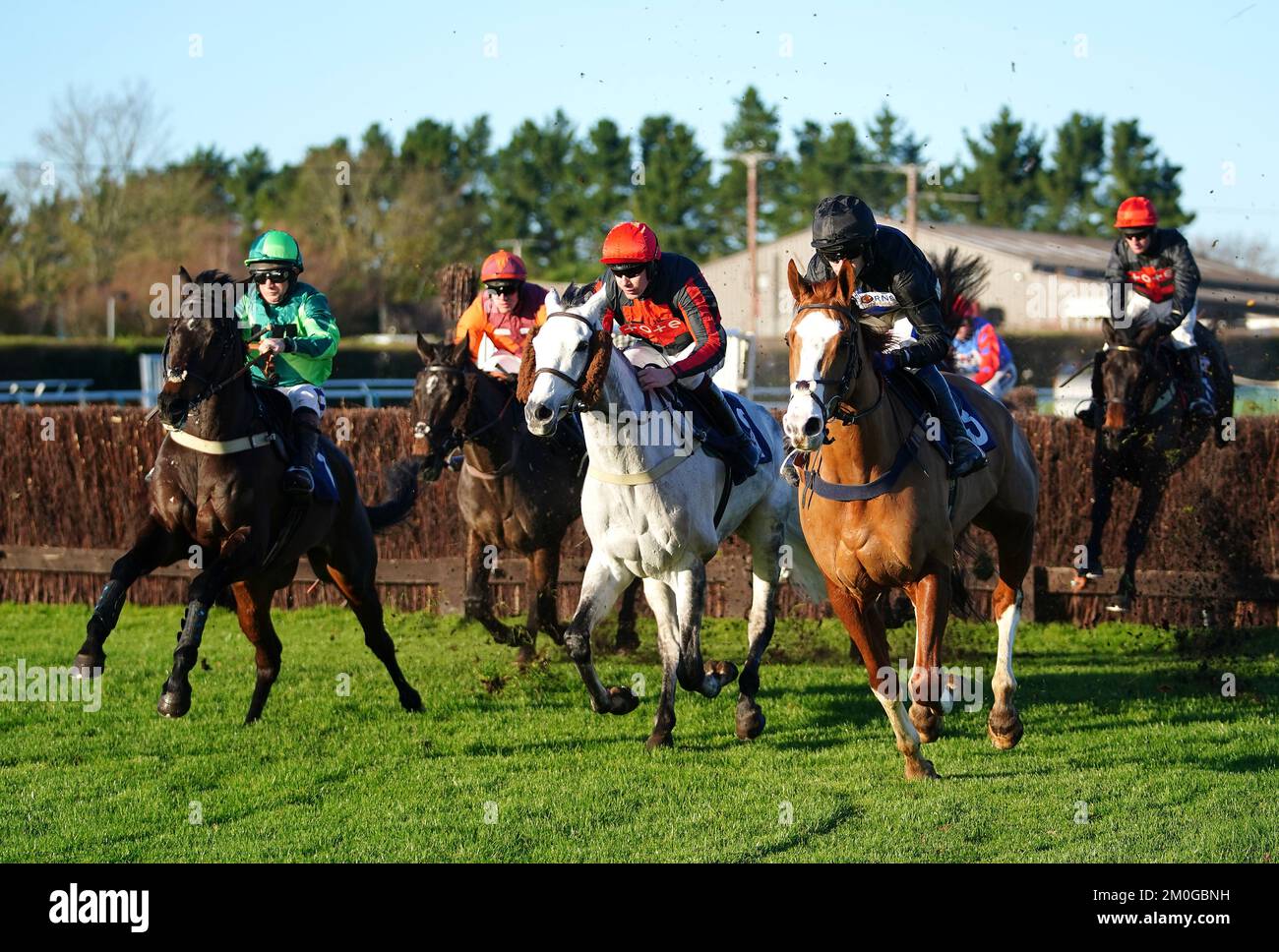 Foxboro ridden by jockey Harry Kimber (centre) on their way to winning ...
