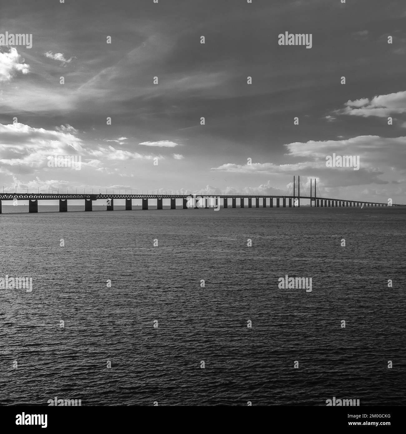 The famous Oresund Bridge over the coast in Malmo, Sweden, grayscale ...