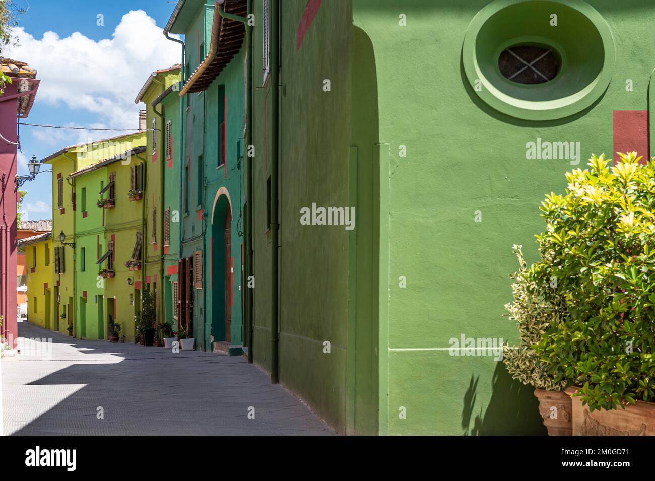 via di mezzo and colored houses, ghizzano, italy Stock Photo - Alamy
