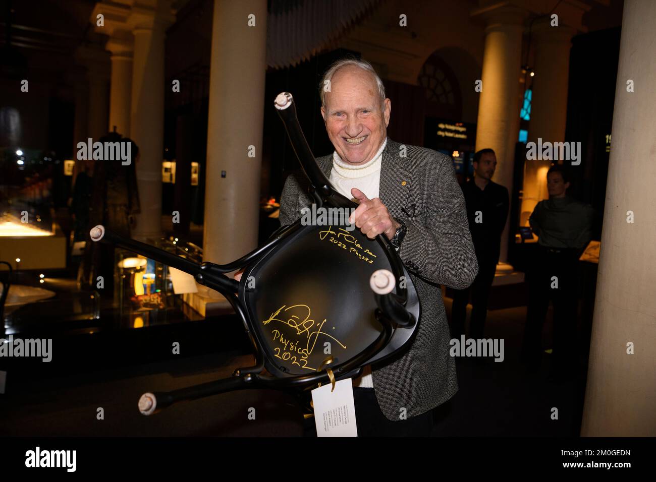 Nobel laureate in Physics 2022 John F. Clauser of the US signs a chair ...