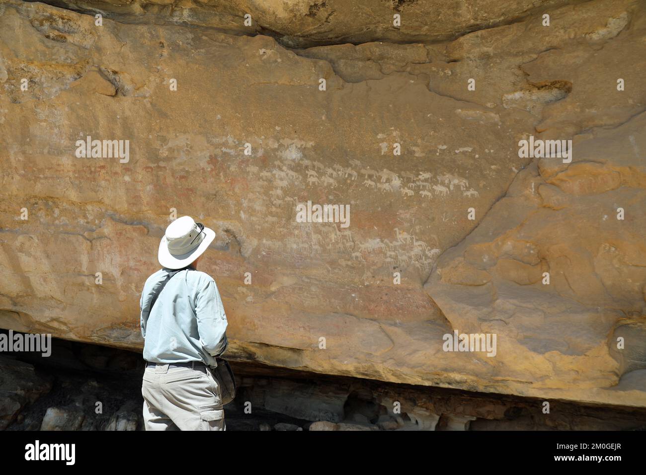 Archaeologist studying the rock art at Qohaito in Eritrea Stock Photo ...