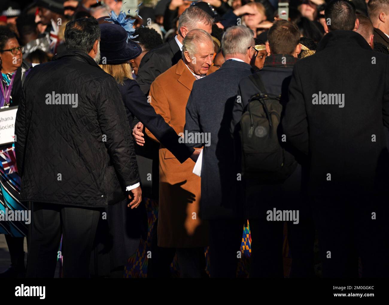 Close-protection officers usher King Charles III out of the way as he ...