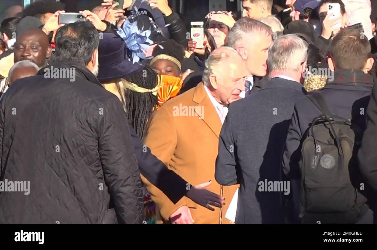 Screen grab taken from PA Video of close-protection officers ushering ...