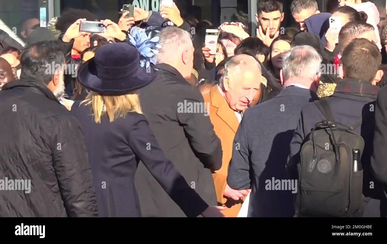 Screen grab taken from PA Video of close-protection officers ushering ...