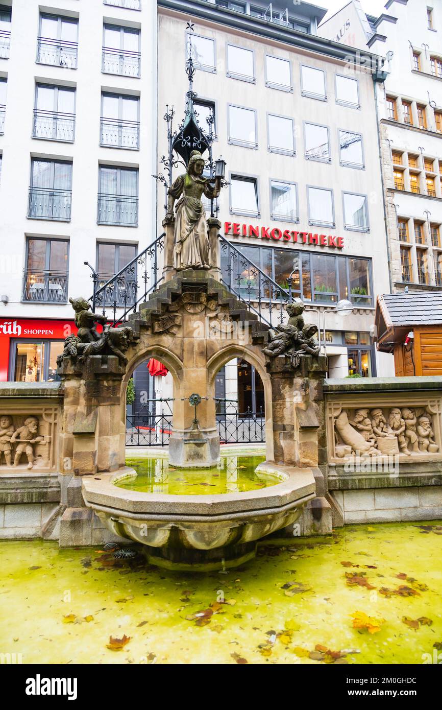 Heinzelmannchenbrunnen statue of Gnomes of Cologne folklore legend. Am ...