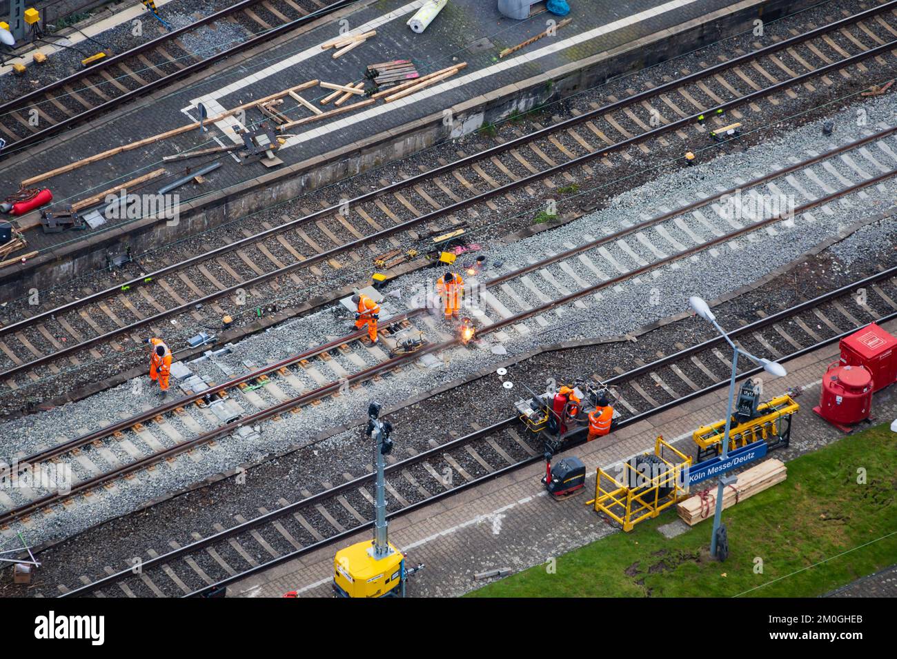 Rail track workers carry out repairs at Koln Messe/Deutz Koln Cologne ...
