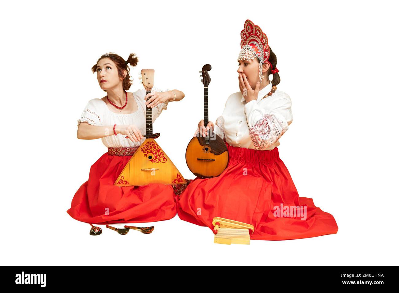 Women musicians in Russian folk dresses with musical instruments ...