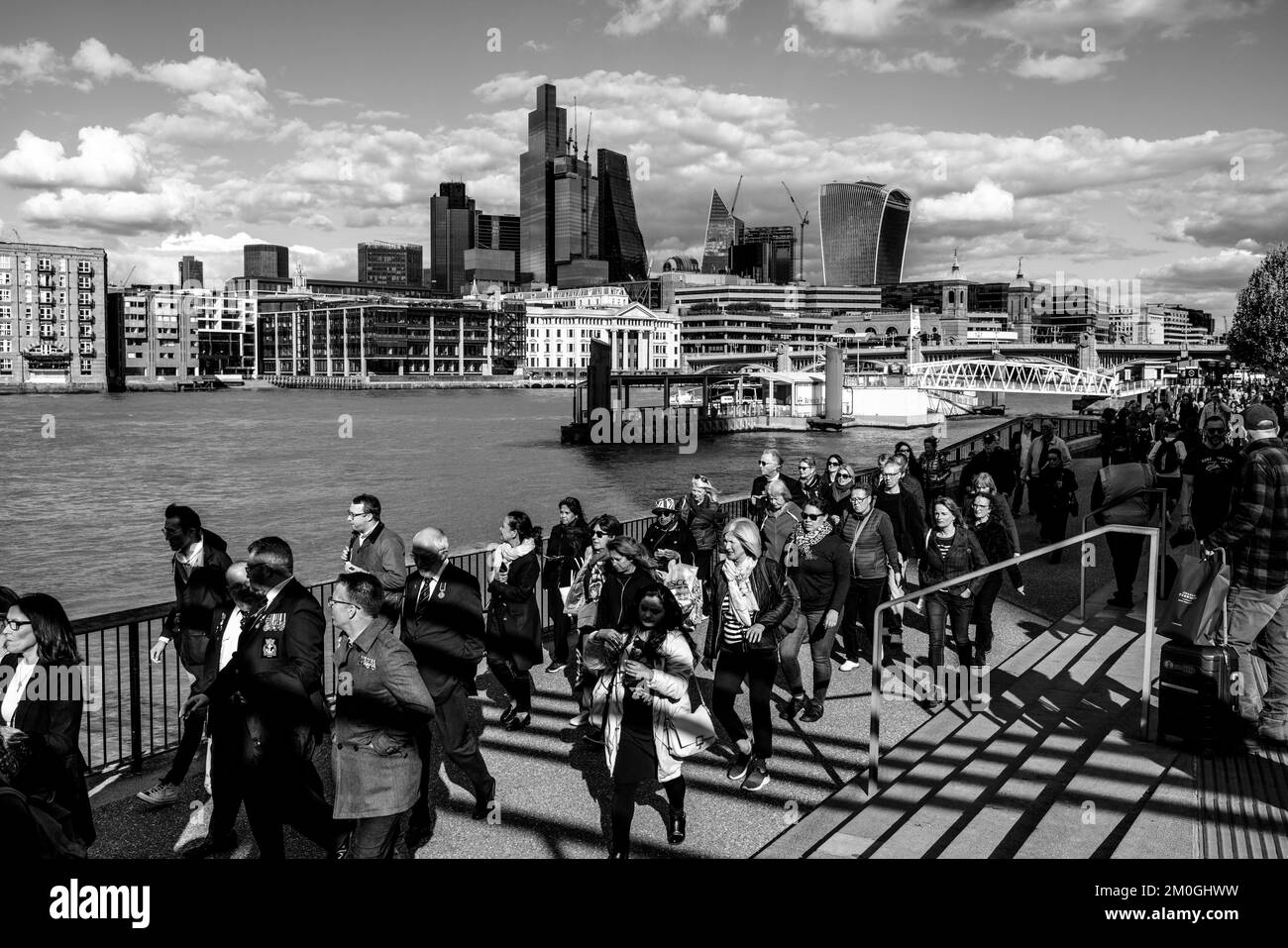 British People and People From Around The World Queue Along The ...