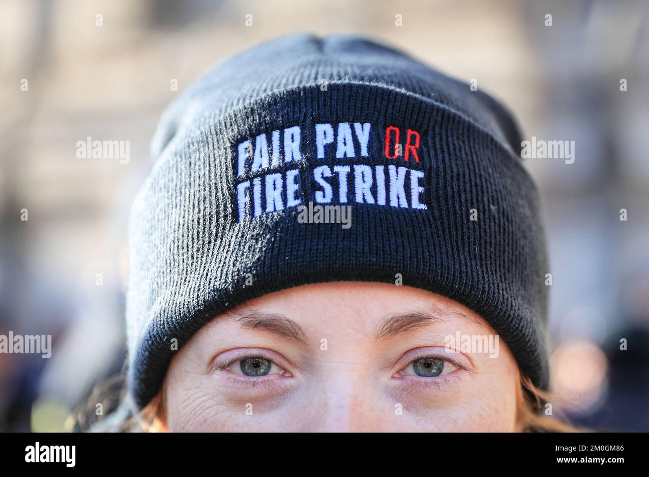 London, UK. 06th Dec, 2022. A female firefighter with "Fair Pay or Fire ...