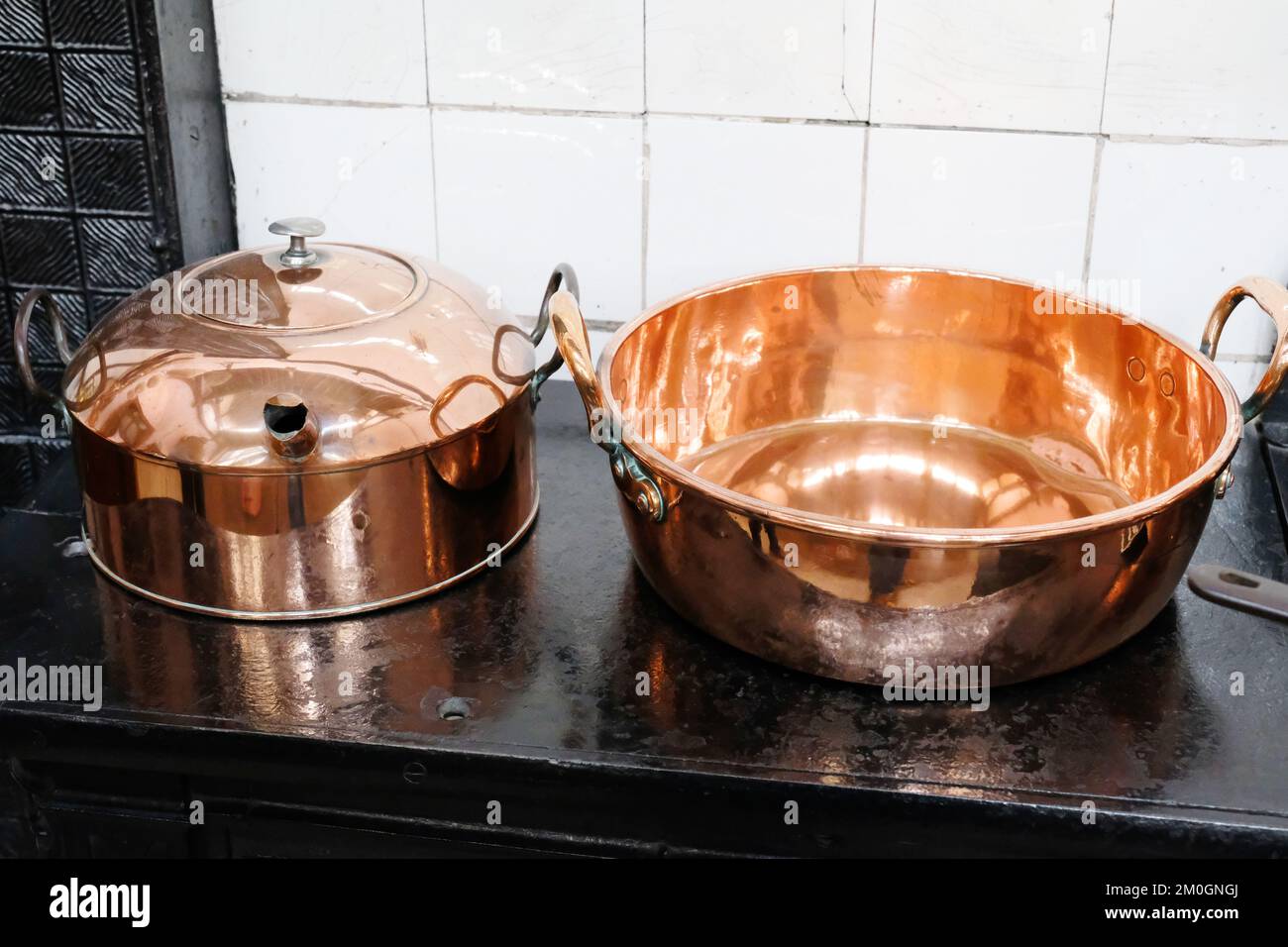 Old fashioned copper pots and pans - John Gollop Stock Photo - Alamy