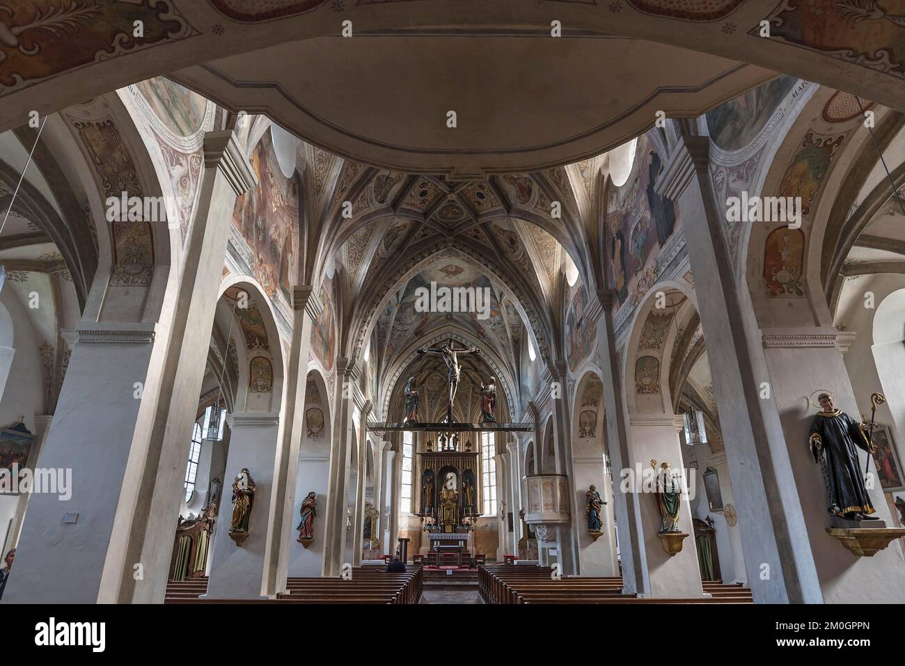 Church room with altar and crucifixion group in the monastery church of ...