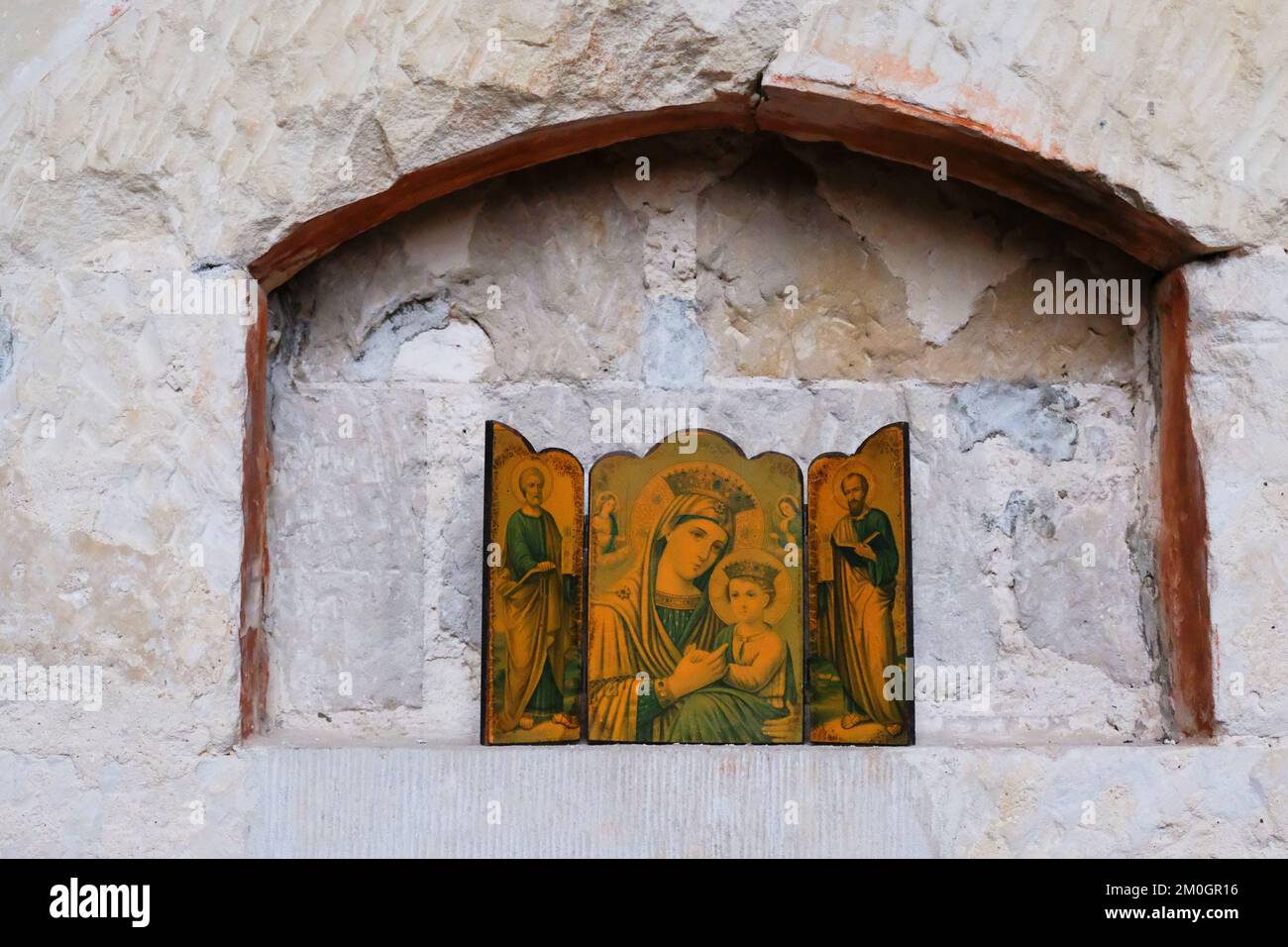 A small religious oil painting triptych at Milton Abbas Abbey Church ...