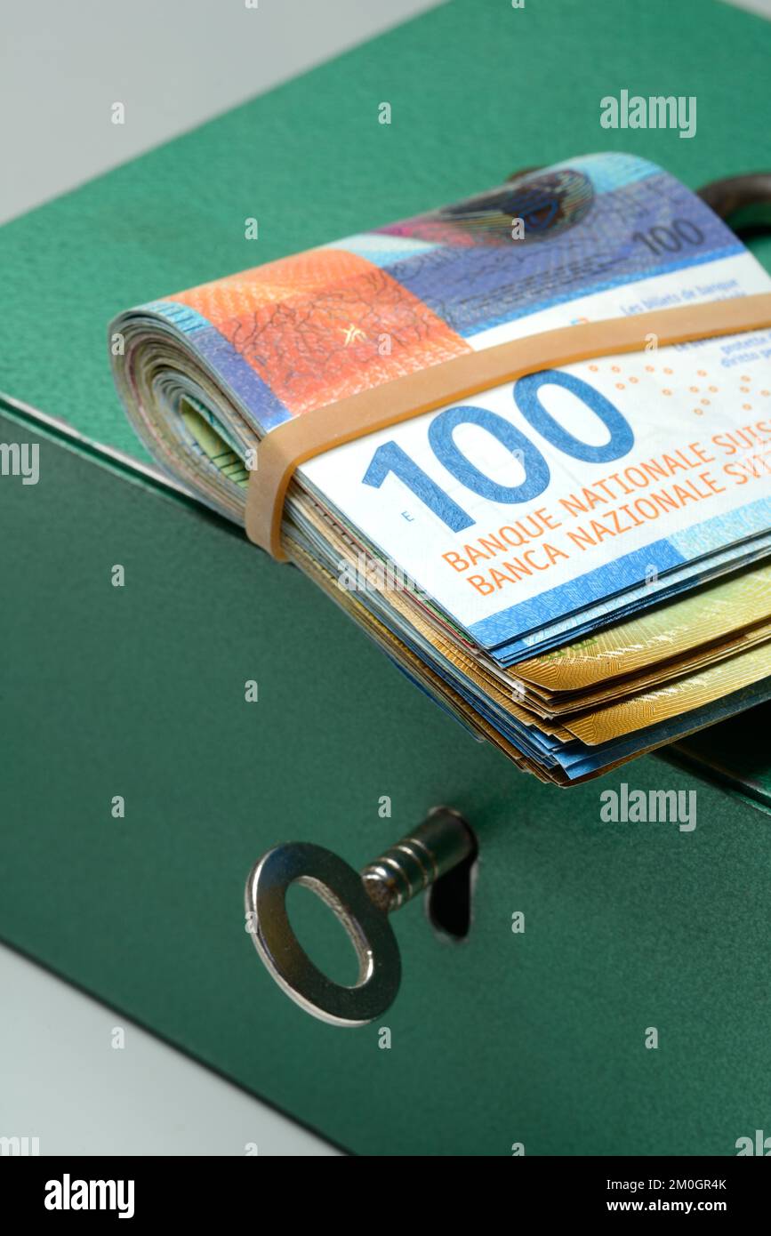 Cash box and Swiss banknotes, money, banknotes Stock Photo - Alamy
