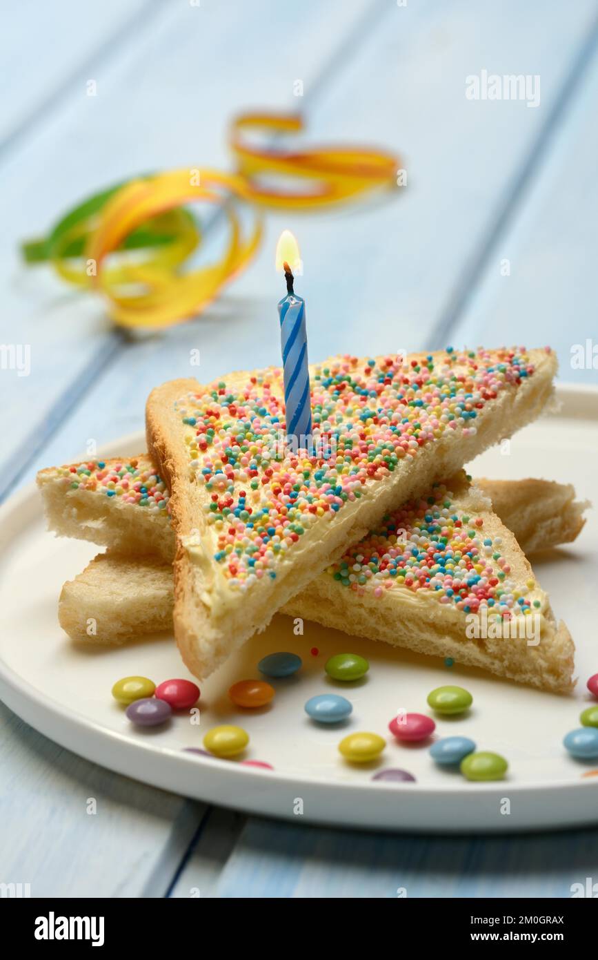 Fairy bread, burning candle on toast with sugar sprinkles, children's ...