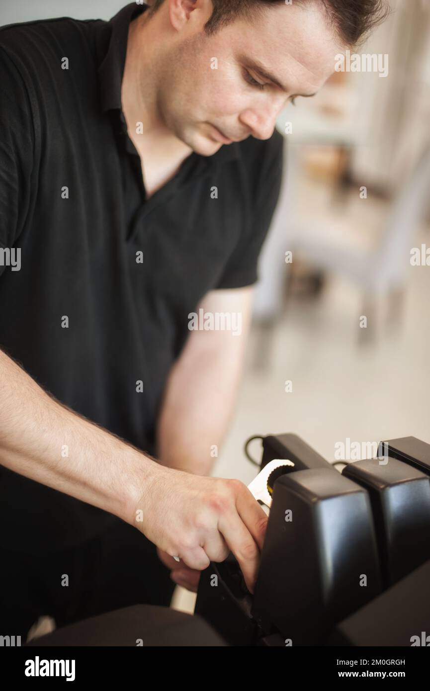 Office machine repairer hi-res stock photography and images - Alamy