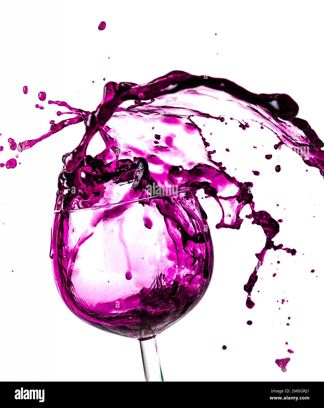 Glass with coloured liquid, studio shot, white background Stock Photo ...