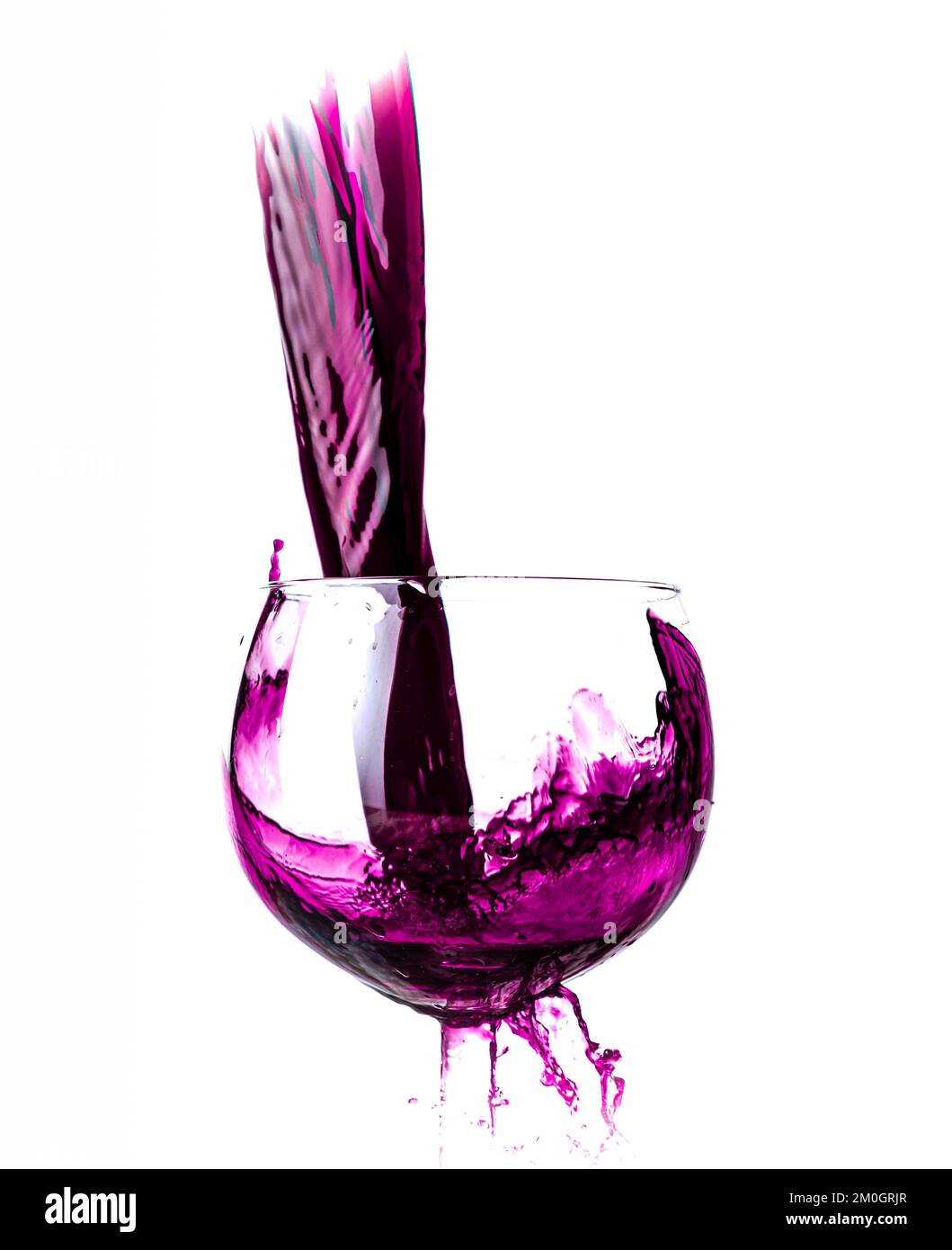 Glass with coloured liquid, studio shot, white background Stock Photo ...