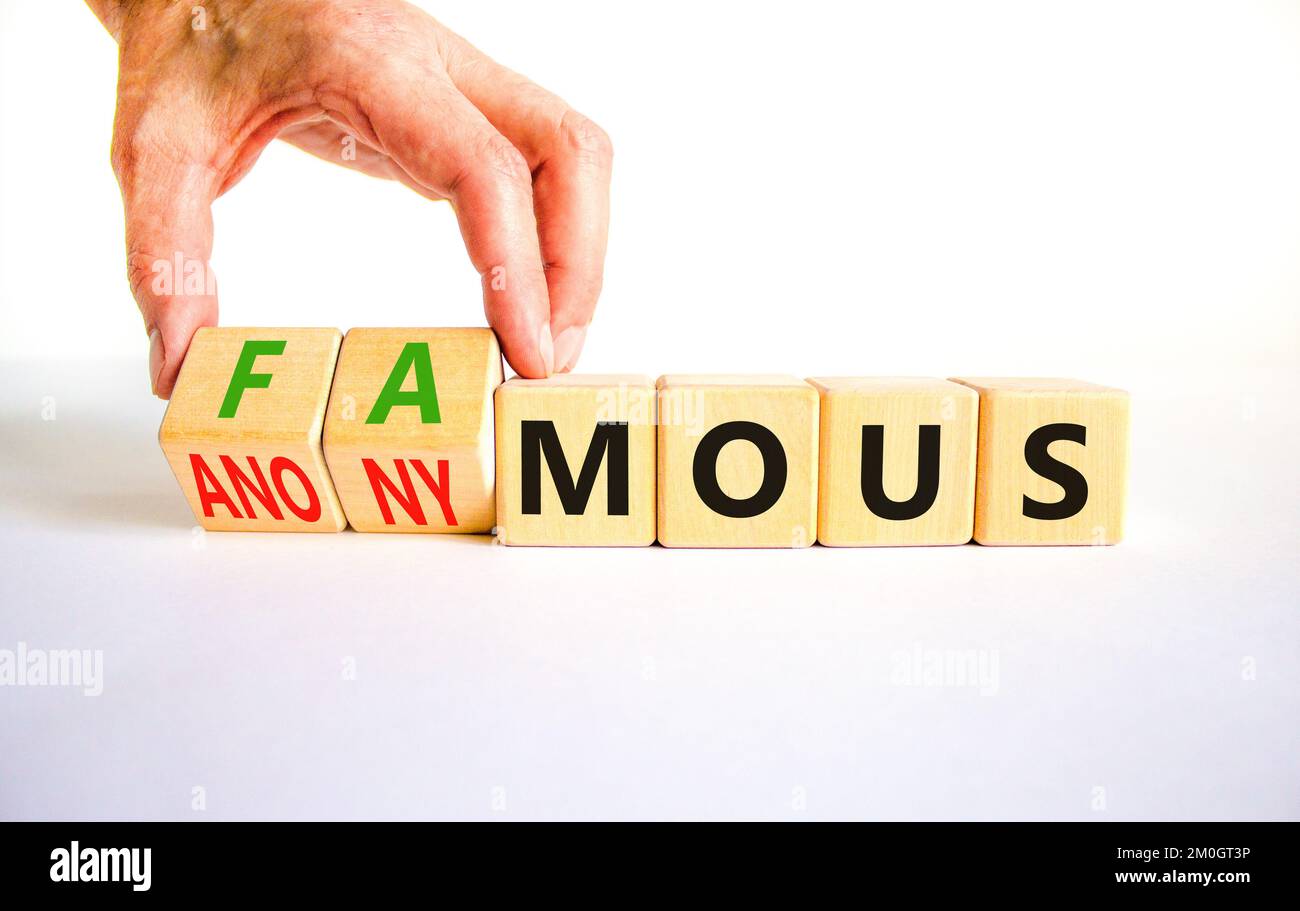 Famous or anonymous symbol. Concept word Famous and Anonymous on wooden ...